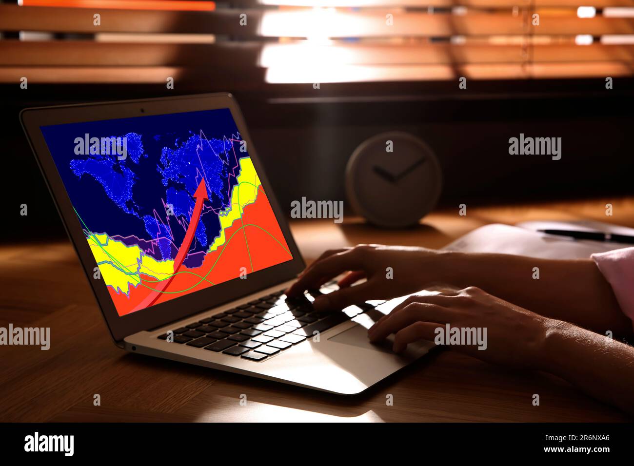 Woman analyzing situation on international market via laptop, closeup ...