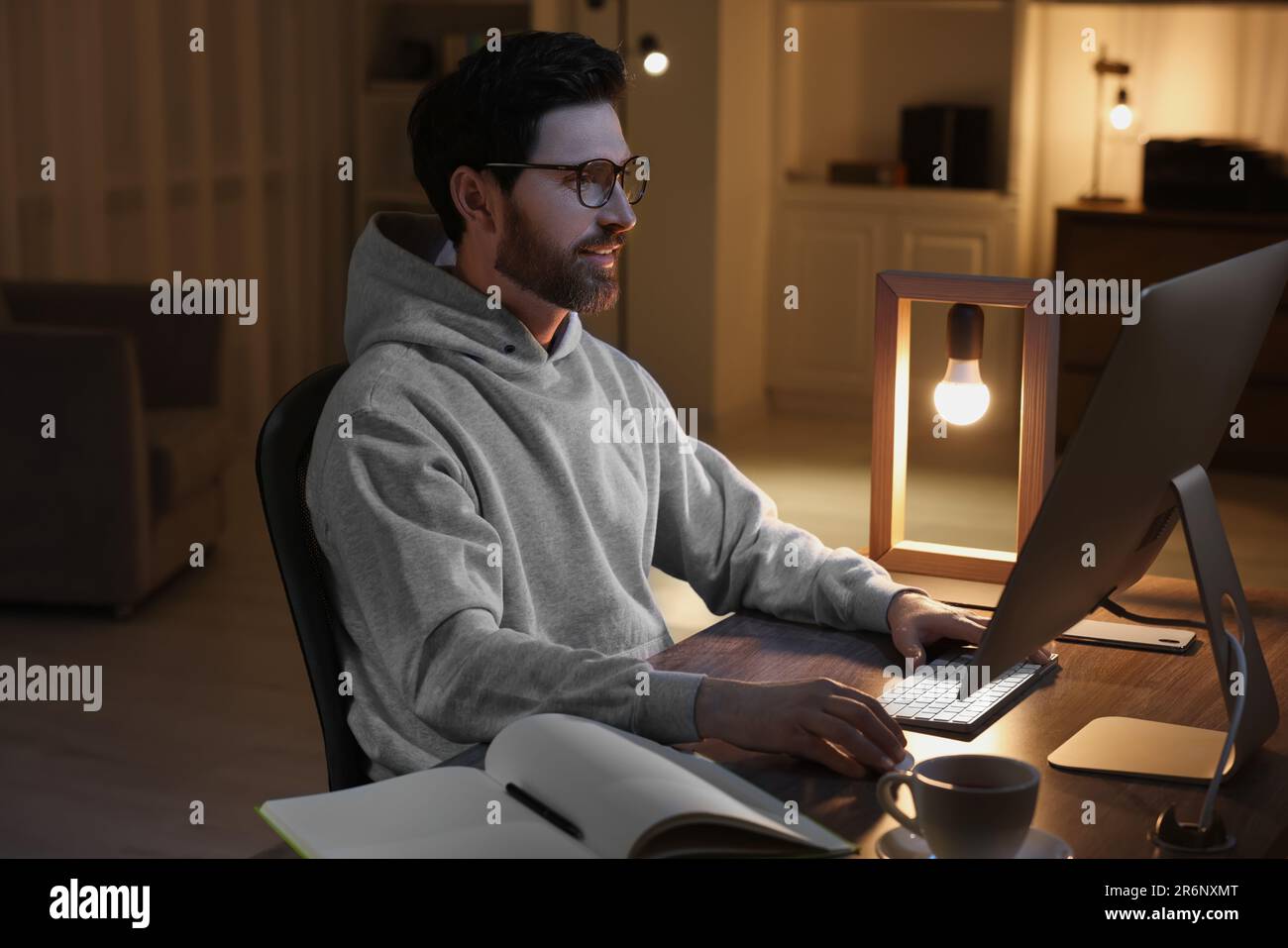 Back view of man computer night hi-res stock photography and images - Alamy