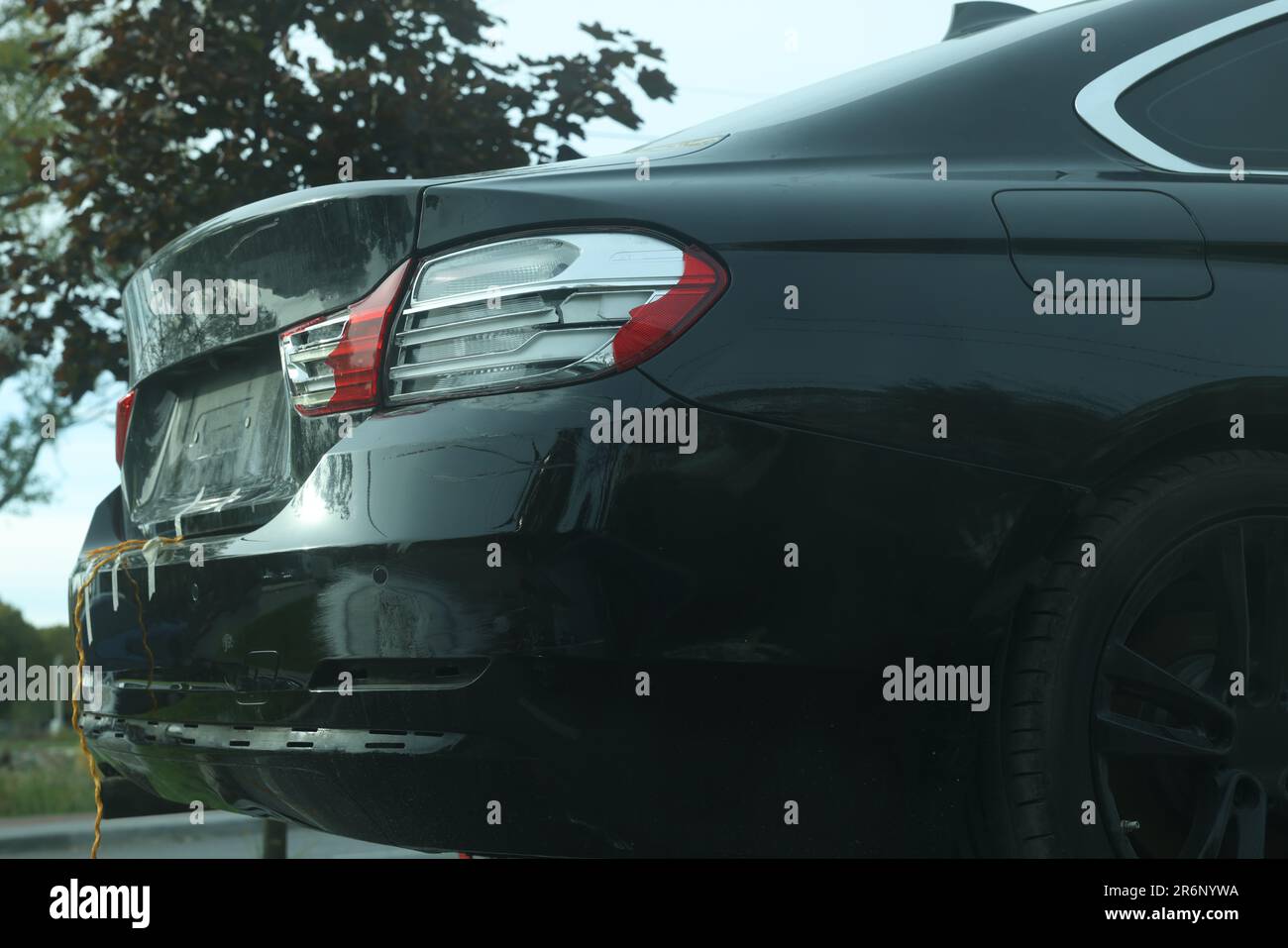 Modern black car with scratch outdoors, closeup view Stock Photo - Alamy
