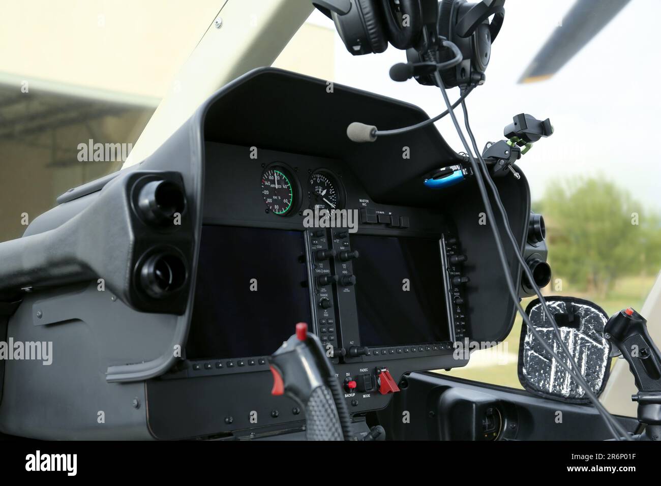 Helicopter cockpit with new modern functional panel Stock Photo - Alamy