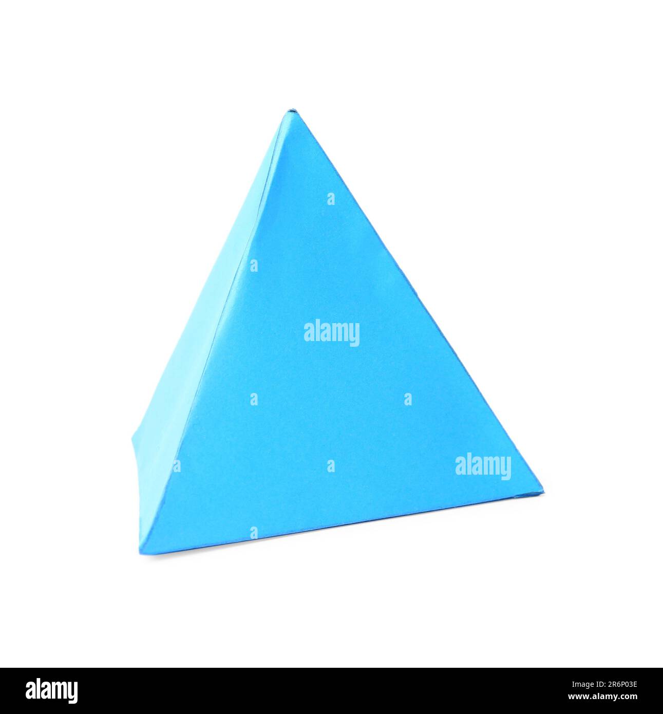 Light blue paper pyramid isolated on white. Origami art Stock Photo - Alamy