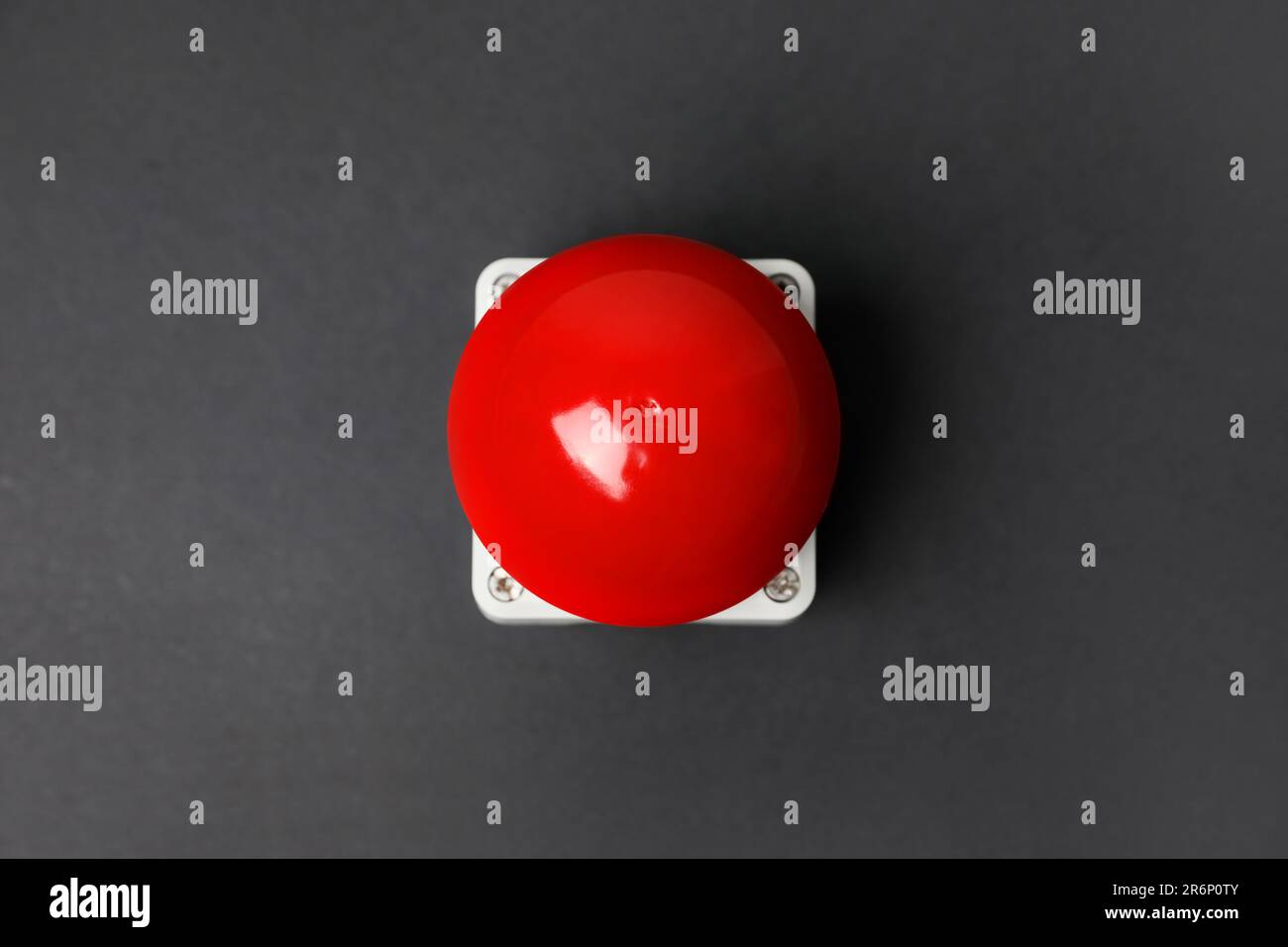Red button of nuclear weapon on grey background, top view. War concept ...