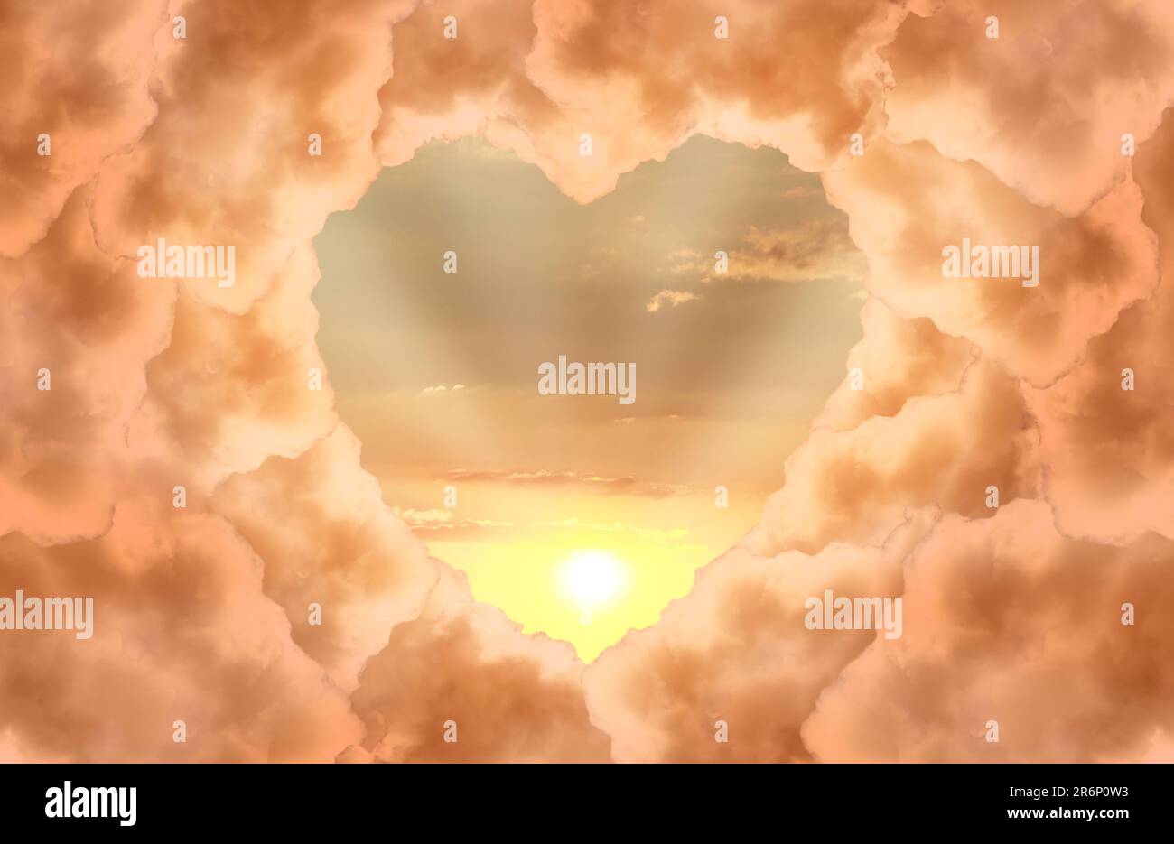 Beautiful sunset, view through heart shaped gap formed from orange ...