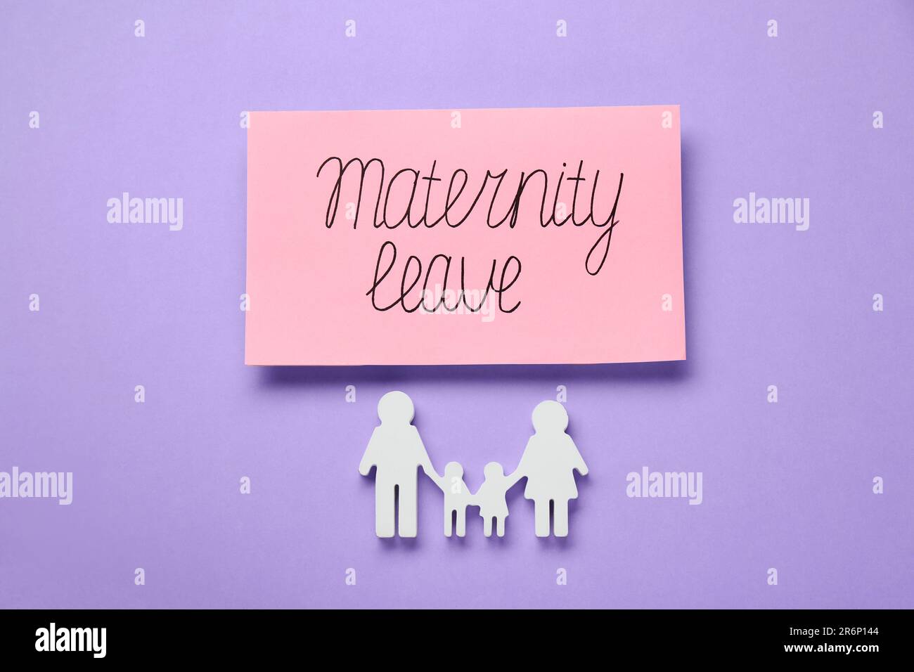 Card with phrase Maternity Leave and figures of family on violet ...