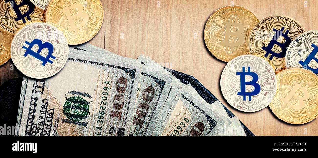 Bitcoins, dollar banknotes and wallet on wooden background, flat lay ...