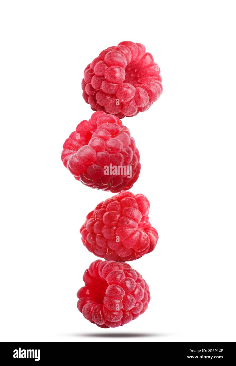 Fresh ripe raspberries falling on white background Stock Photo - Alamy