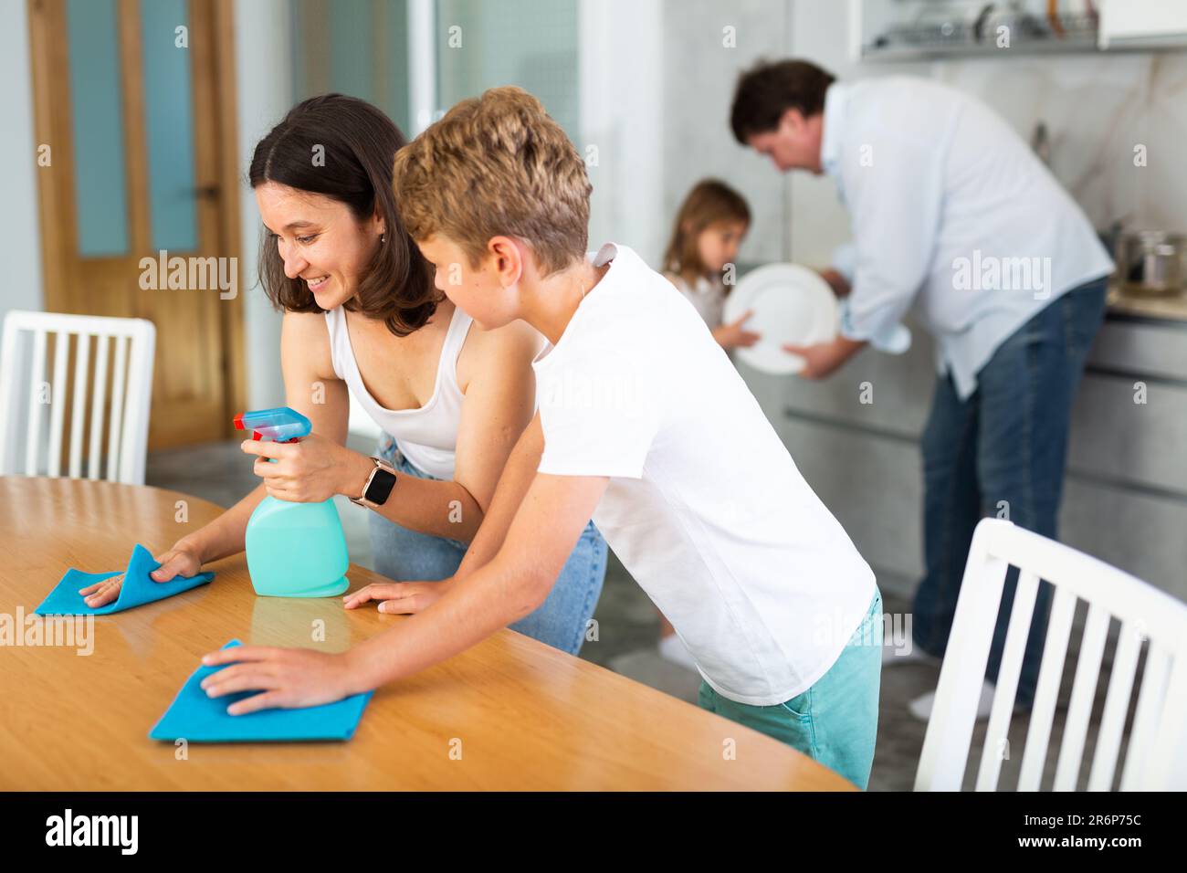 Housework mom with children cleaning and washing hi-res stock ...