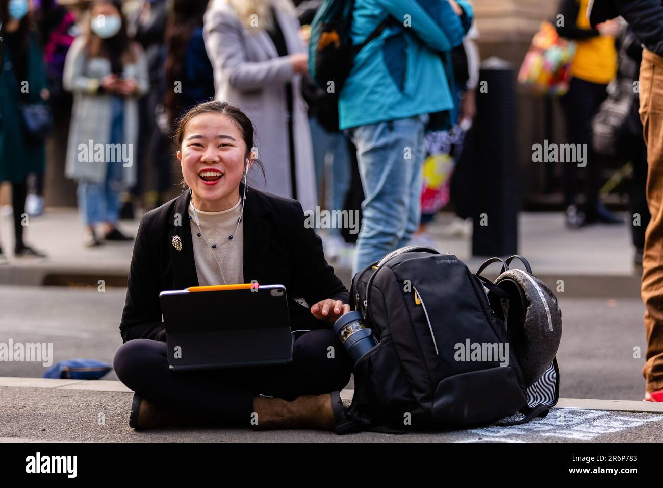 MELBOURNE, AUSTRALIA - JUNE 06: A woman is seen singing to her self ...