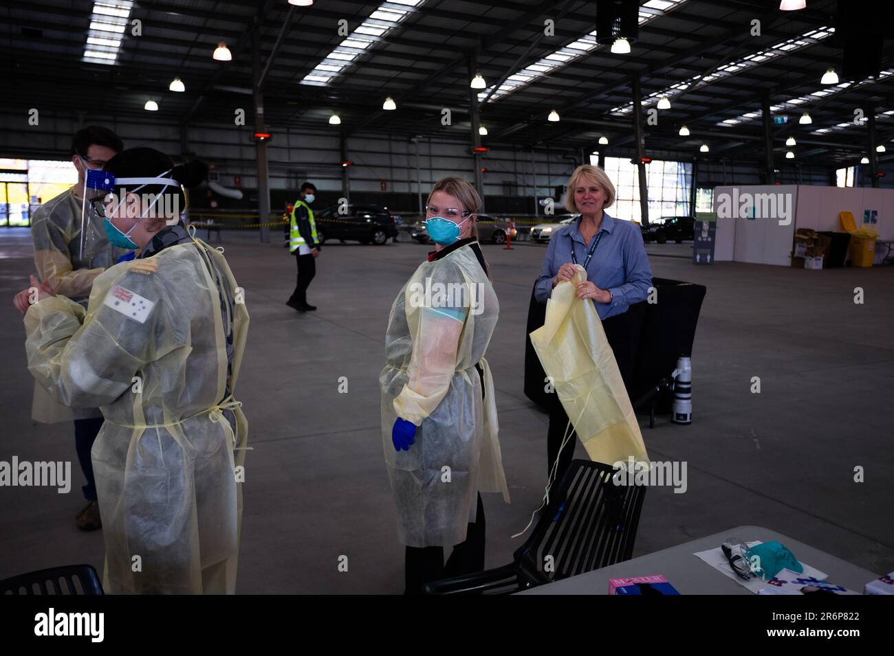 MELBOURNE, AUSTRALIA - June 27: Civilian and Military medics change PPE ...