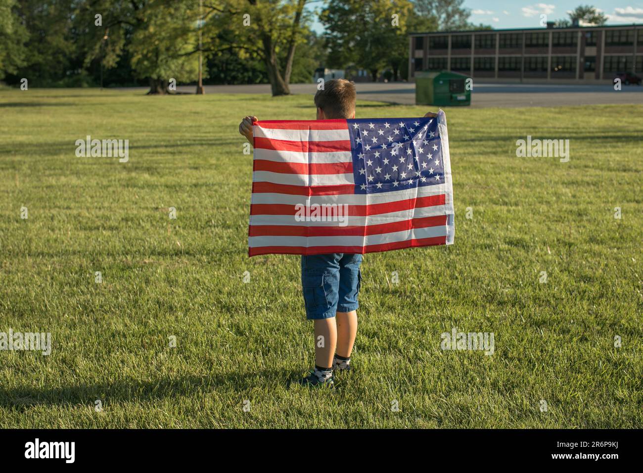 Kid boy celebrating of July, 4 Independence Day of USA . Child running ...