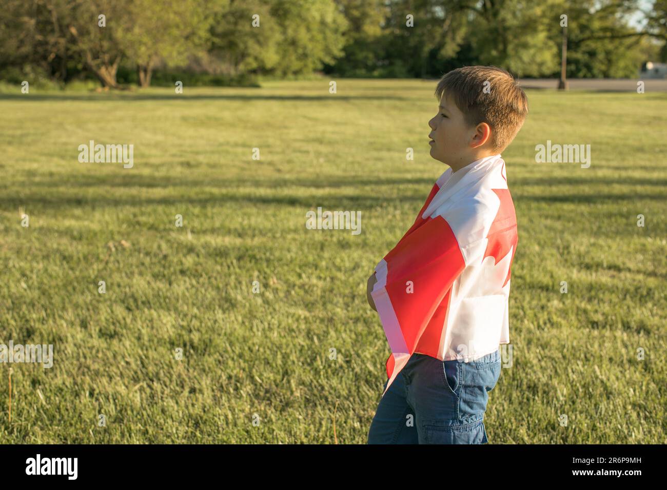 Kid boy holding Canada flag. Canadian National Holiday. 1 July Stock ...