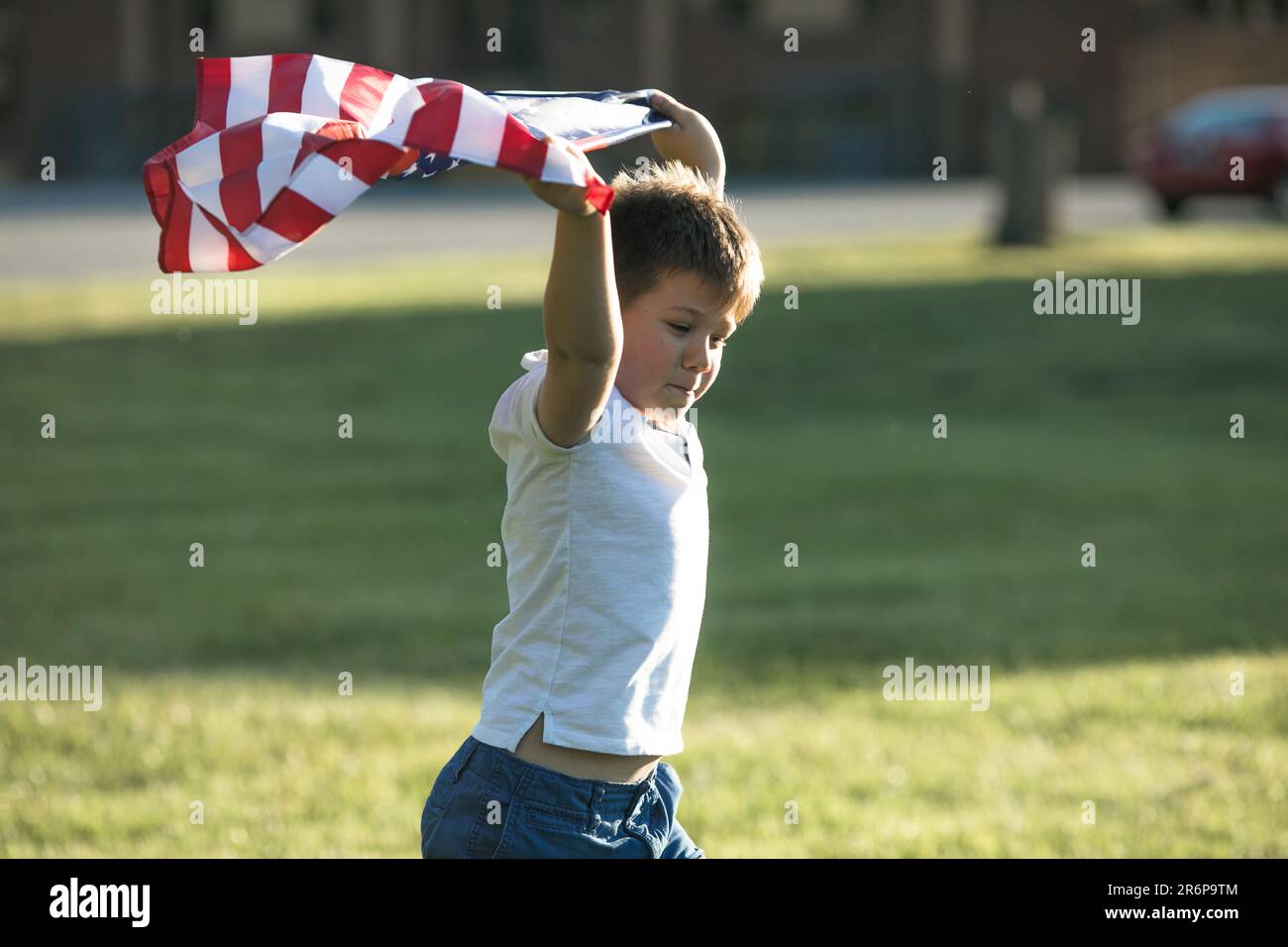 Kid boy celebrating of July, 4 Independence Day of USA . Child running ...