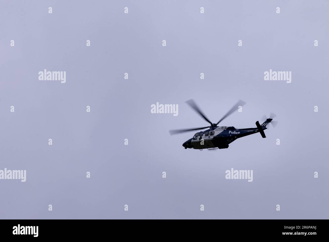 MELBOURNE, VIC - SEPTEMBER 23: A police Chopper is sen searching the ...