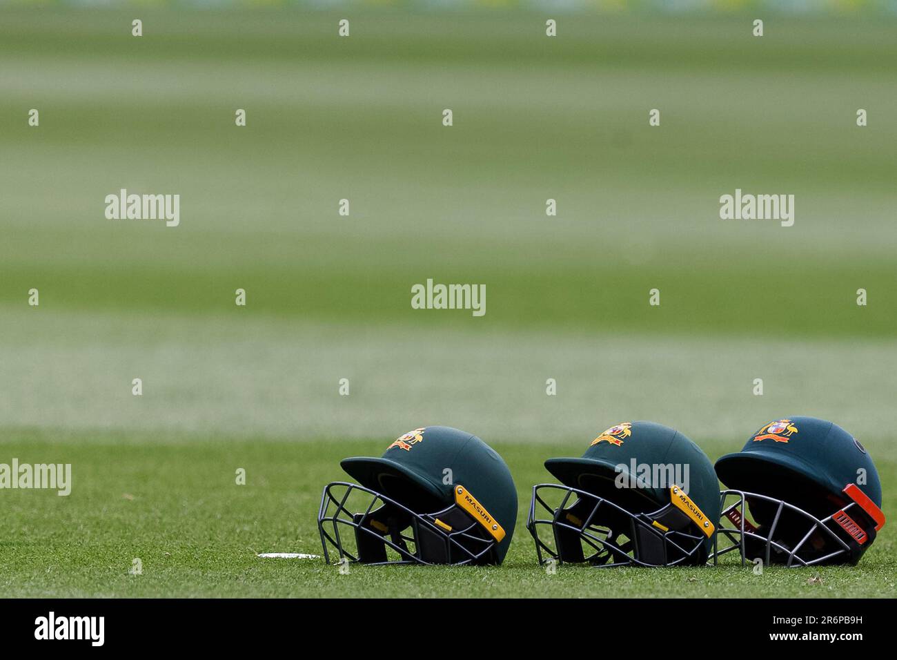 MELBOURNE, AUSTRALIA - DECEMBER 27: Australian Helmets lay on the field ...