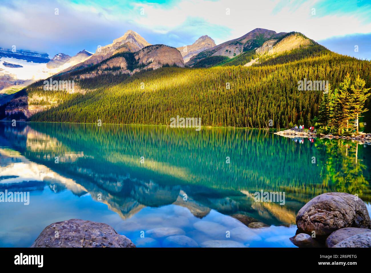 The Iconic, world famous, picture perfect Lake Louise is framed in the ...