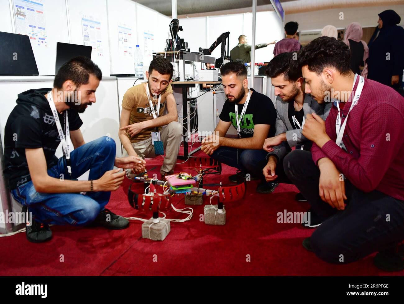 Damascus, Syria. 10th June, 2023. Young men are seen at an exhibition of technologies in ...
