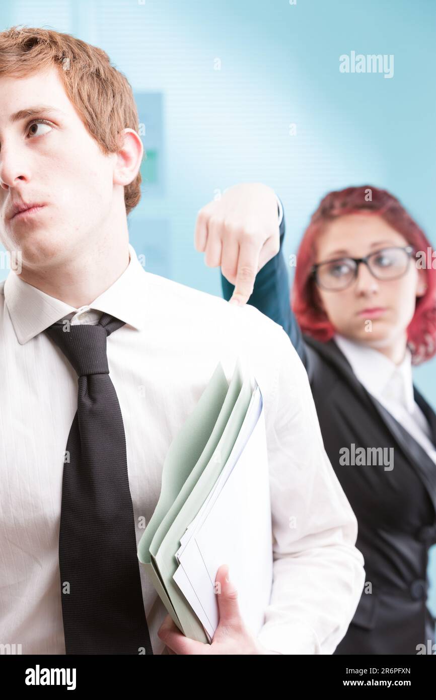 Abusive behavior: A woman showing uncontrolled anger towards a male ...