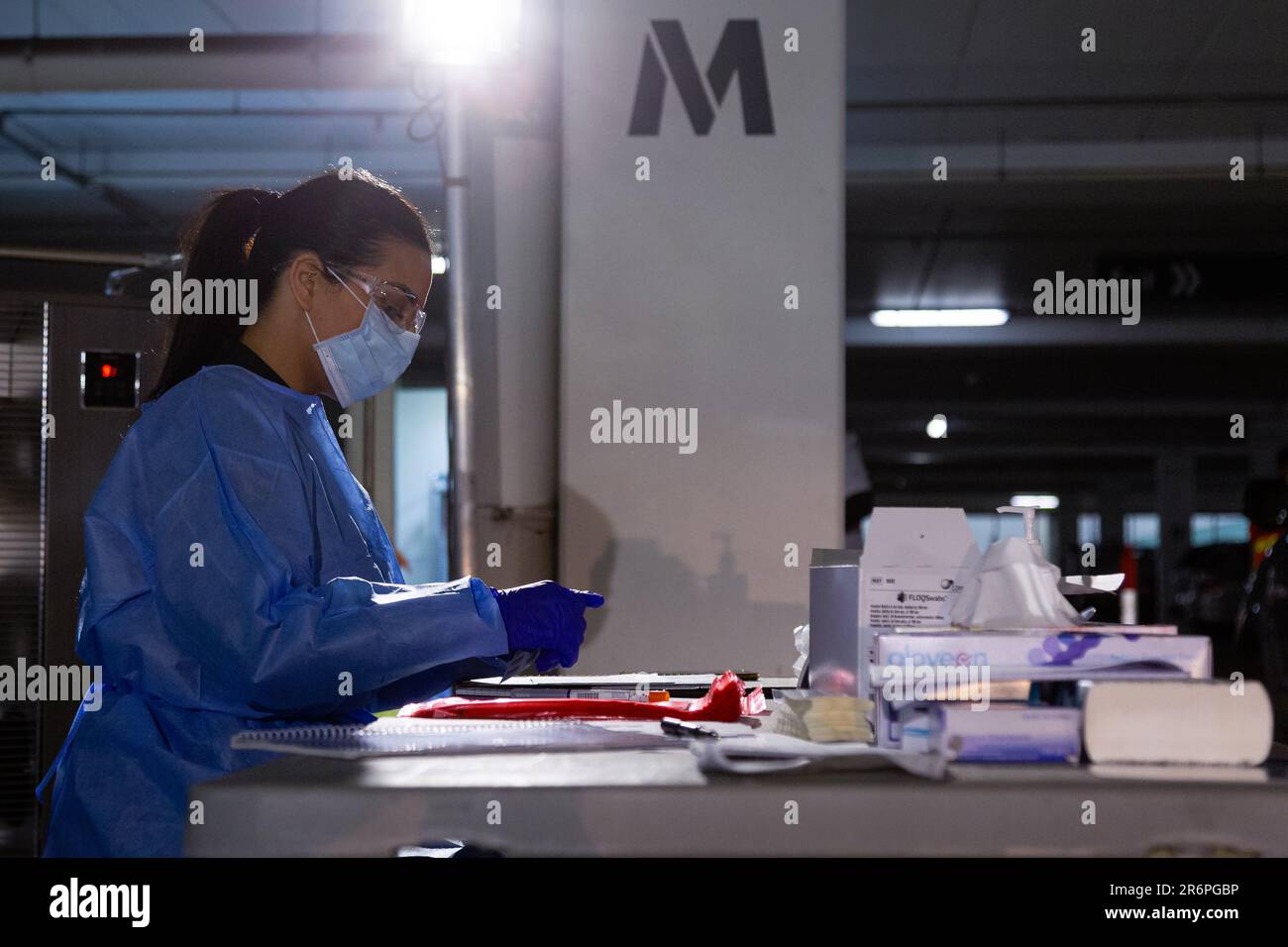 MELBOURNE, AUSTRALIA - APRIL 30: A nurse wearing full PPE processes ...