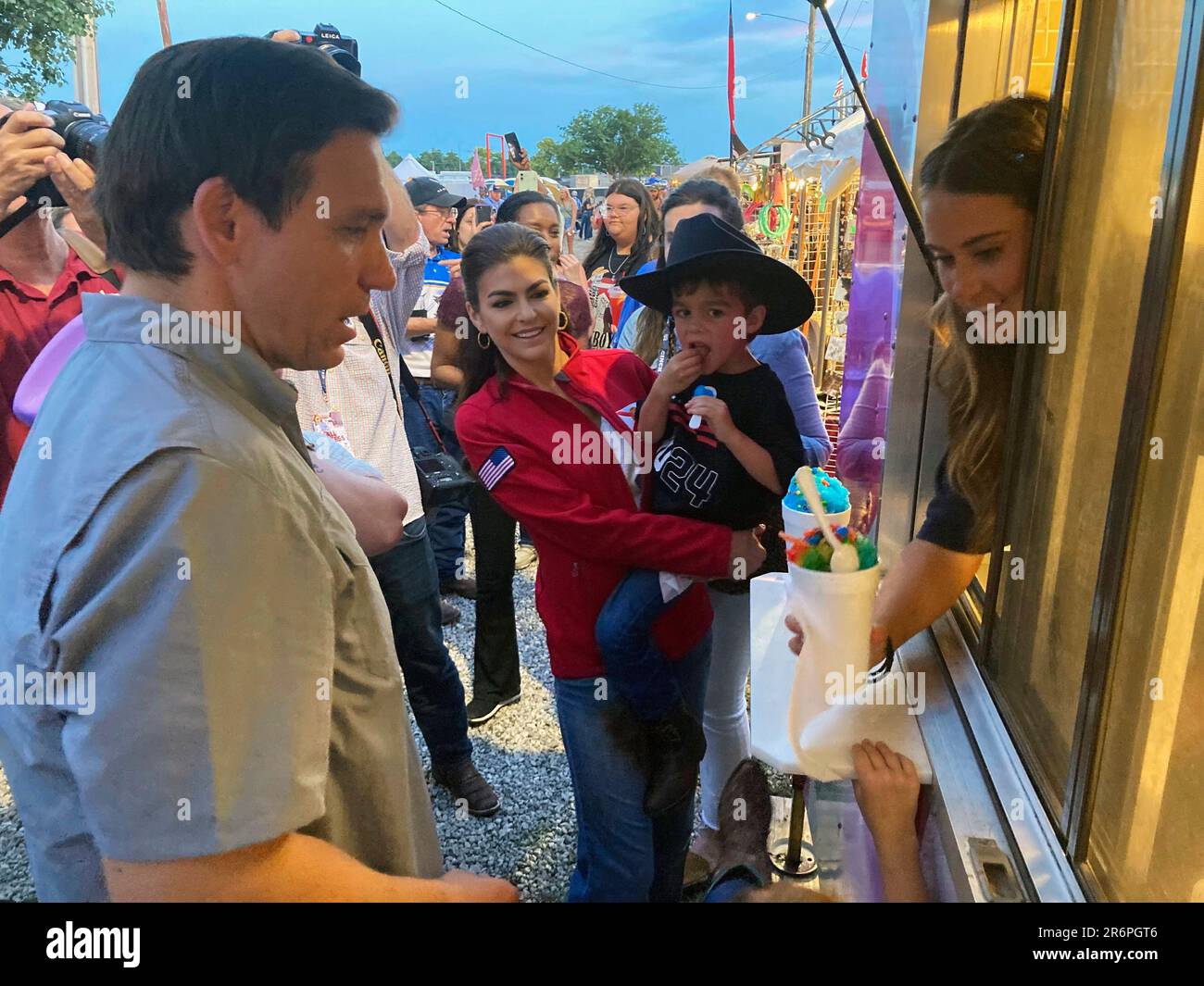Casey DeSantis, center, and son Mason watch as husband and father ...