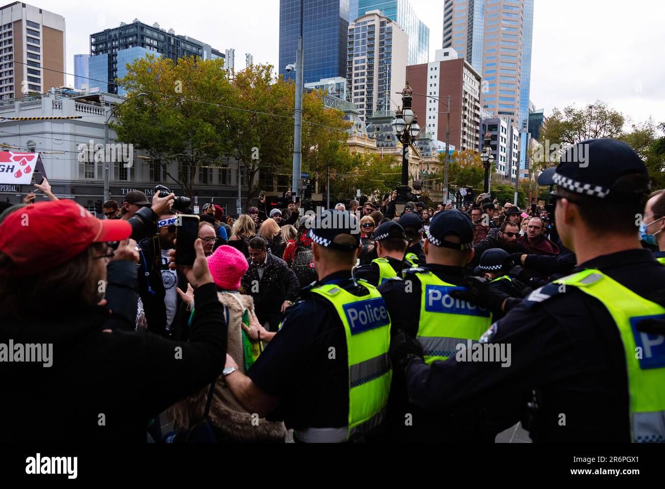 MELBOURNE, AUSTRALIA - MAY 10: Police deploy pepper spray to disperse ...