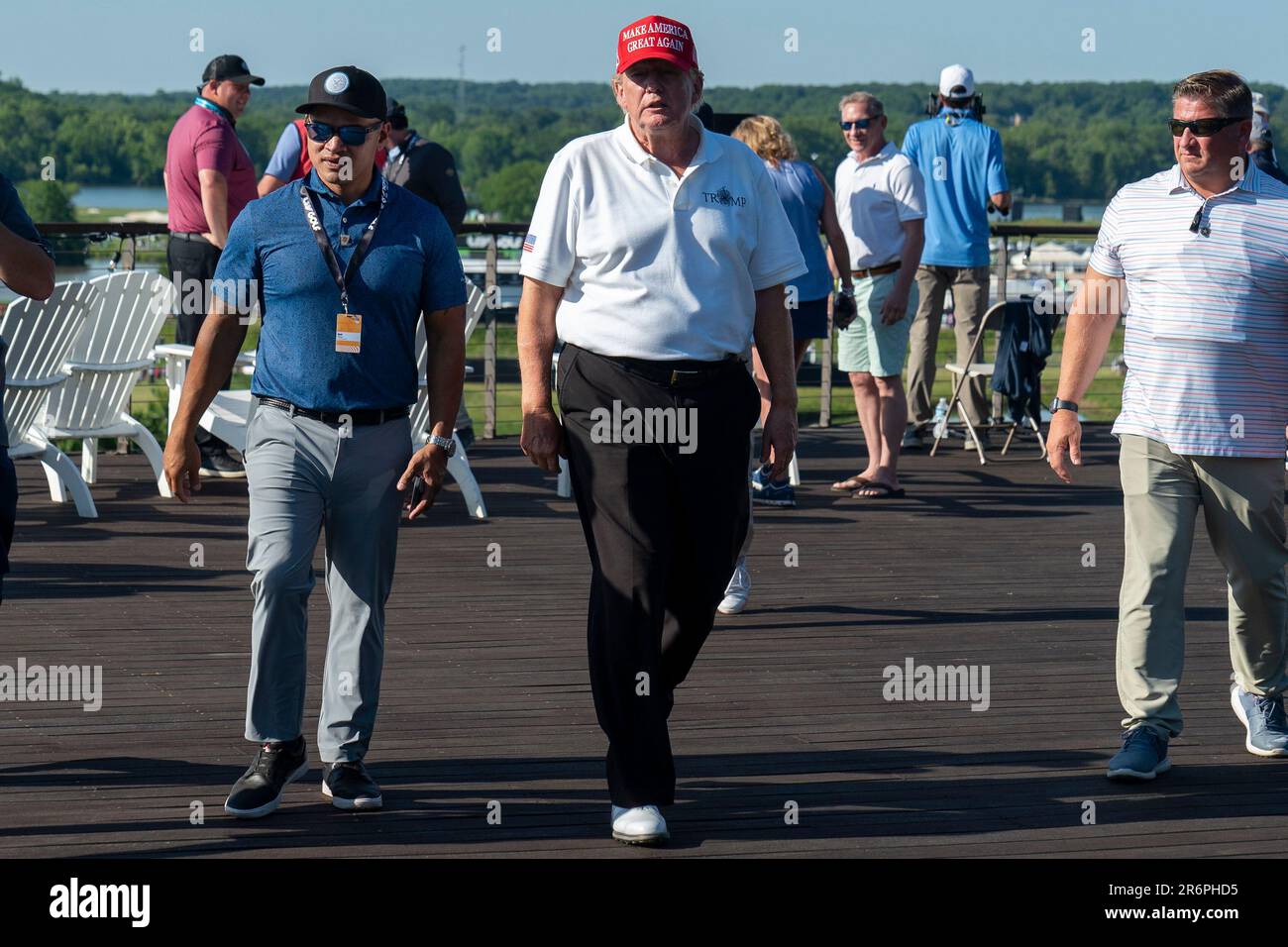 Walt Nauta, left, walks with Former President Donald Trump during the ...