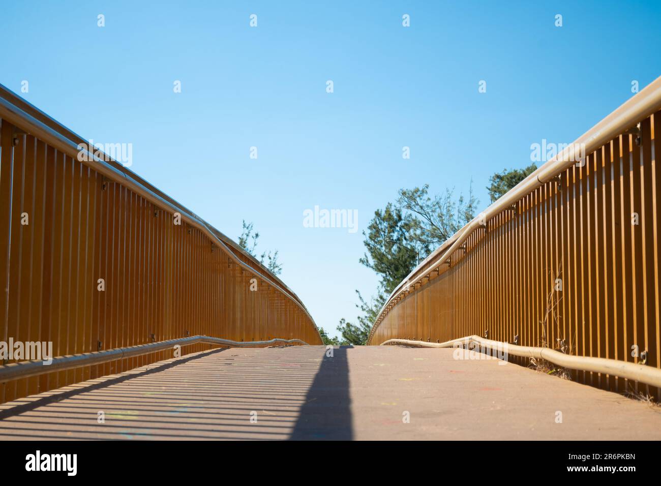 Yellow colored pedestrian overpass walkway, spanning the Crocodile ...