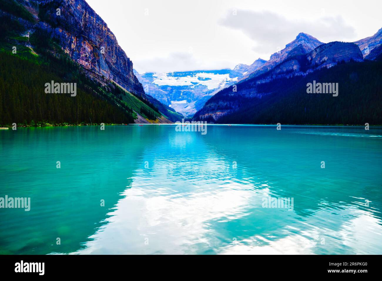 The Iconic, world famous, picture perfect Lake Louise is framed in the ...