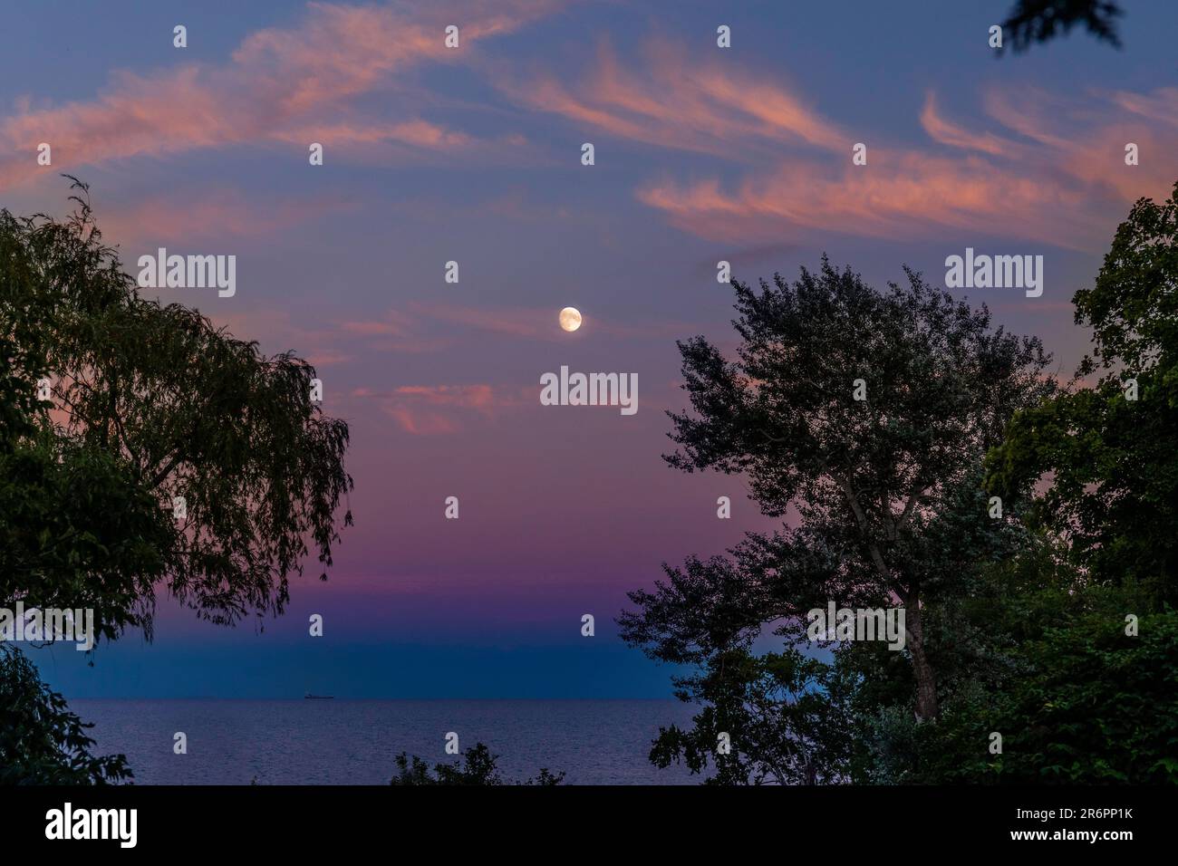 Lake Huron sunset landscape with a full moon from August 9, 2022 at the ...