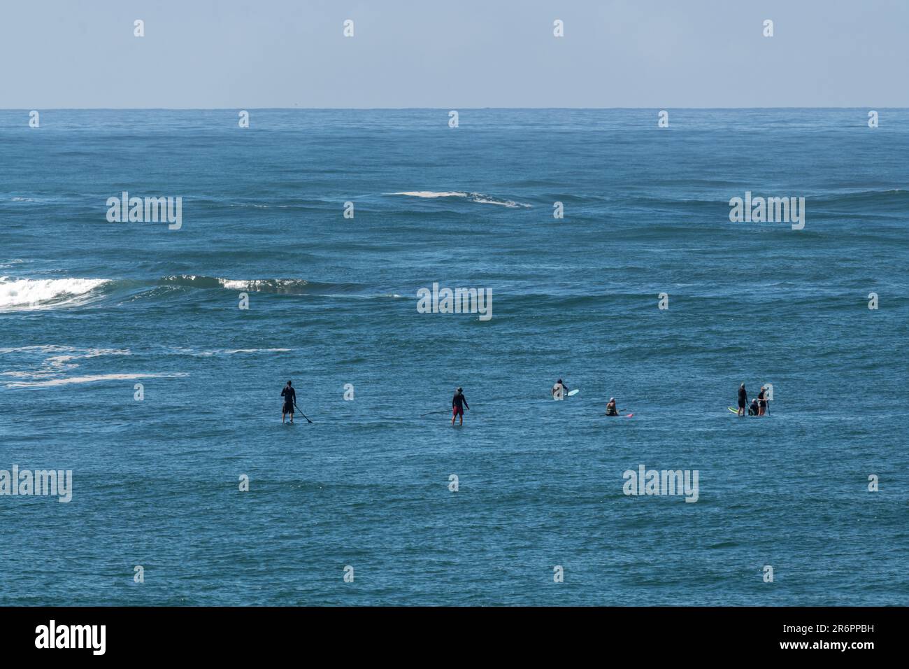 Surfer in the Pacific Ocean area off eastern Australian during autumn ...