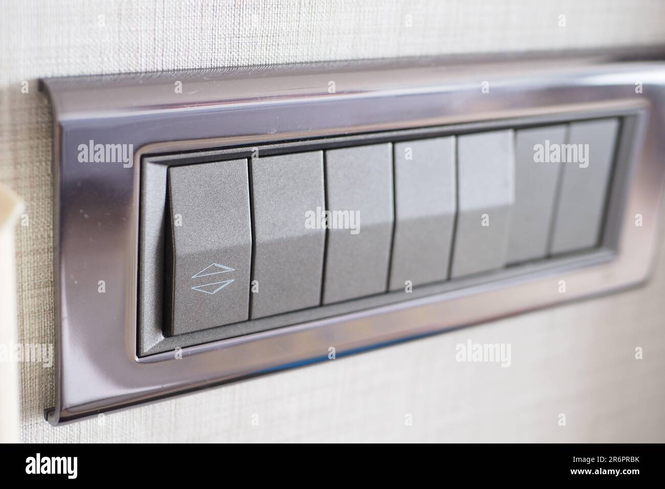 a gray color lighting switch Stock Photo - Alamy