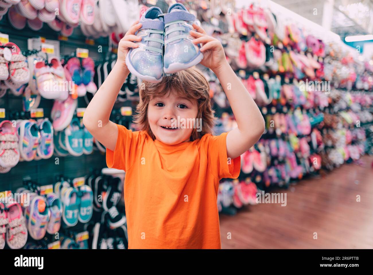 Child buying shoes hi-res stock photography and images - Alamy