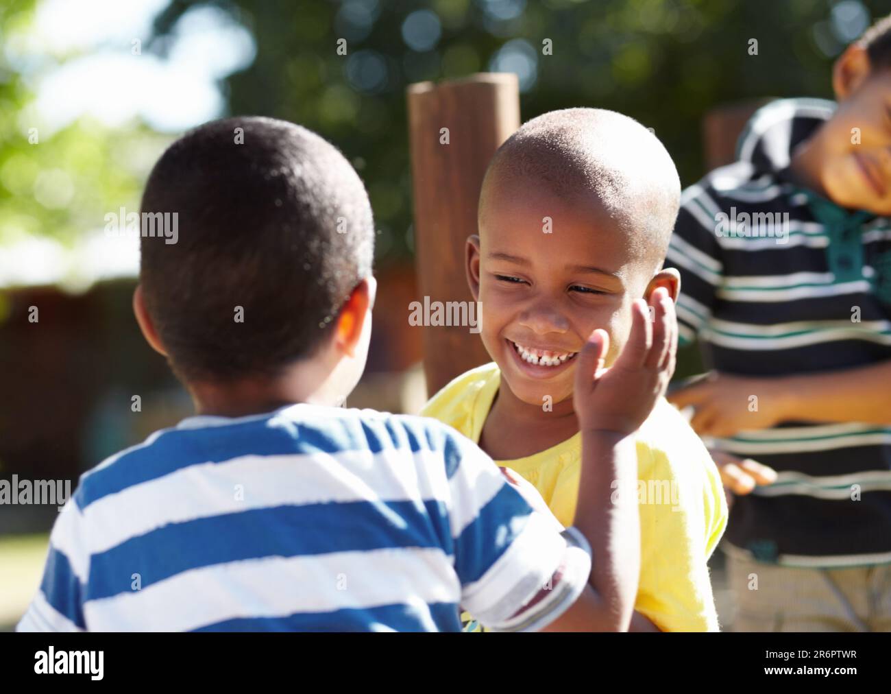 Playground, happy kids or friends in a park playing together outdoors ...