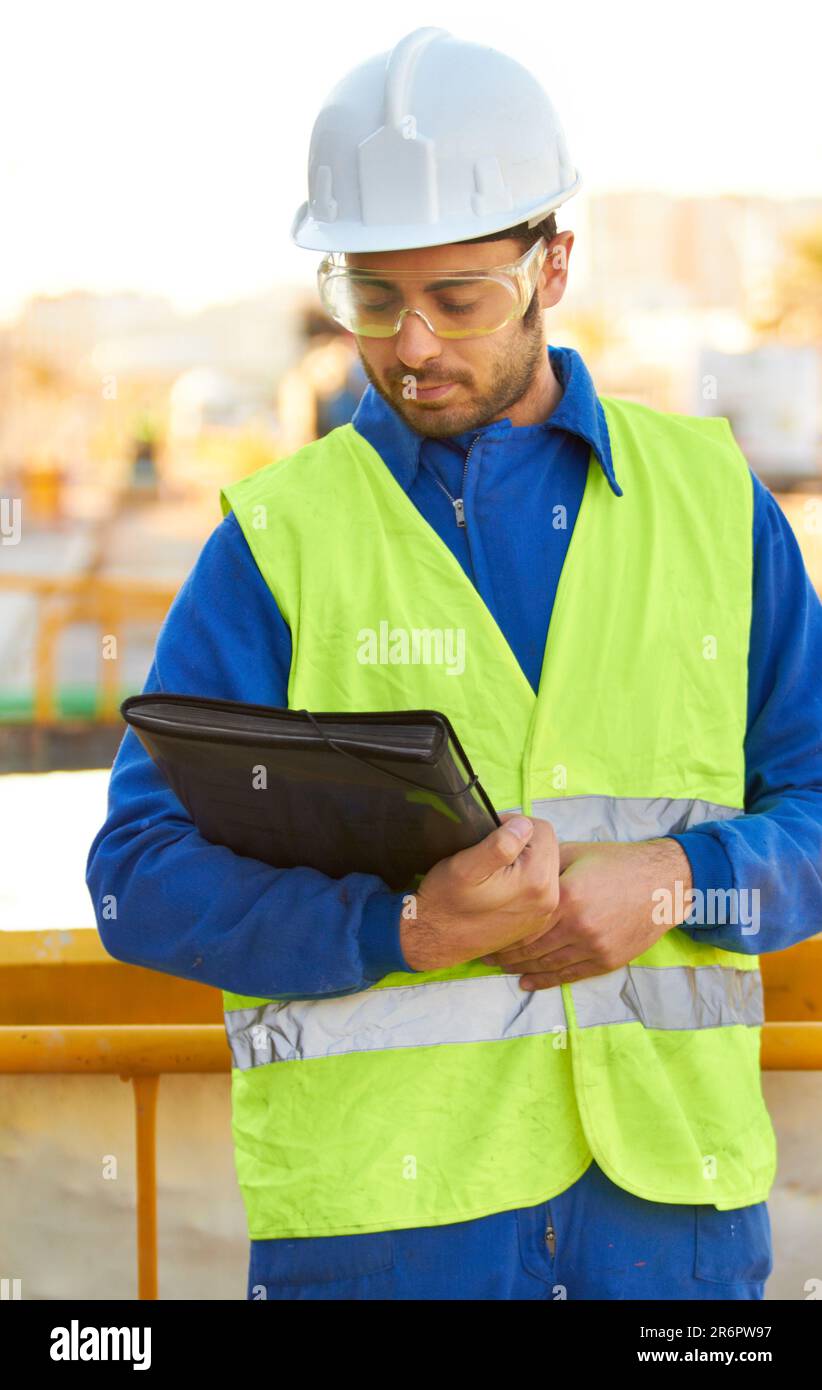 Man, architect and portfolio file for construction planning, blueprint ...