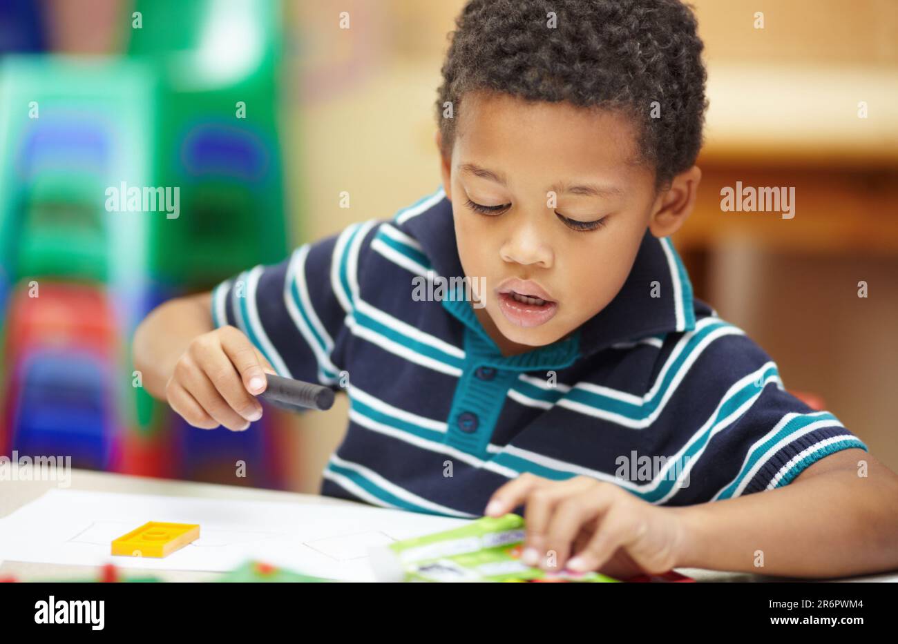 School, creative and a child drawing in a class for education, learning ...