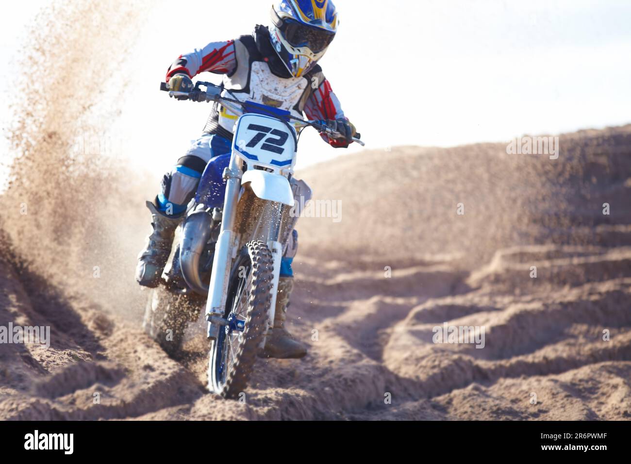 Competition, sand and motorbike for sports with action for challenge on ...