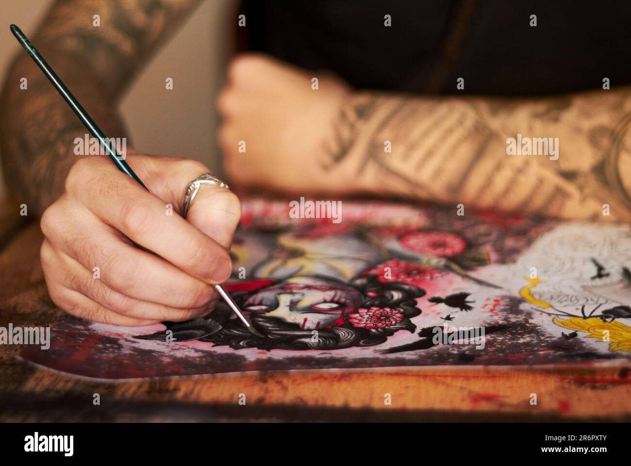 Art, paint and creative with a woman tattoo artist closeup in a studio ...