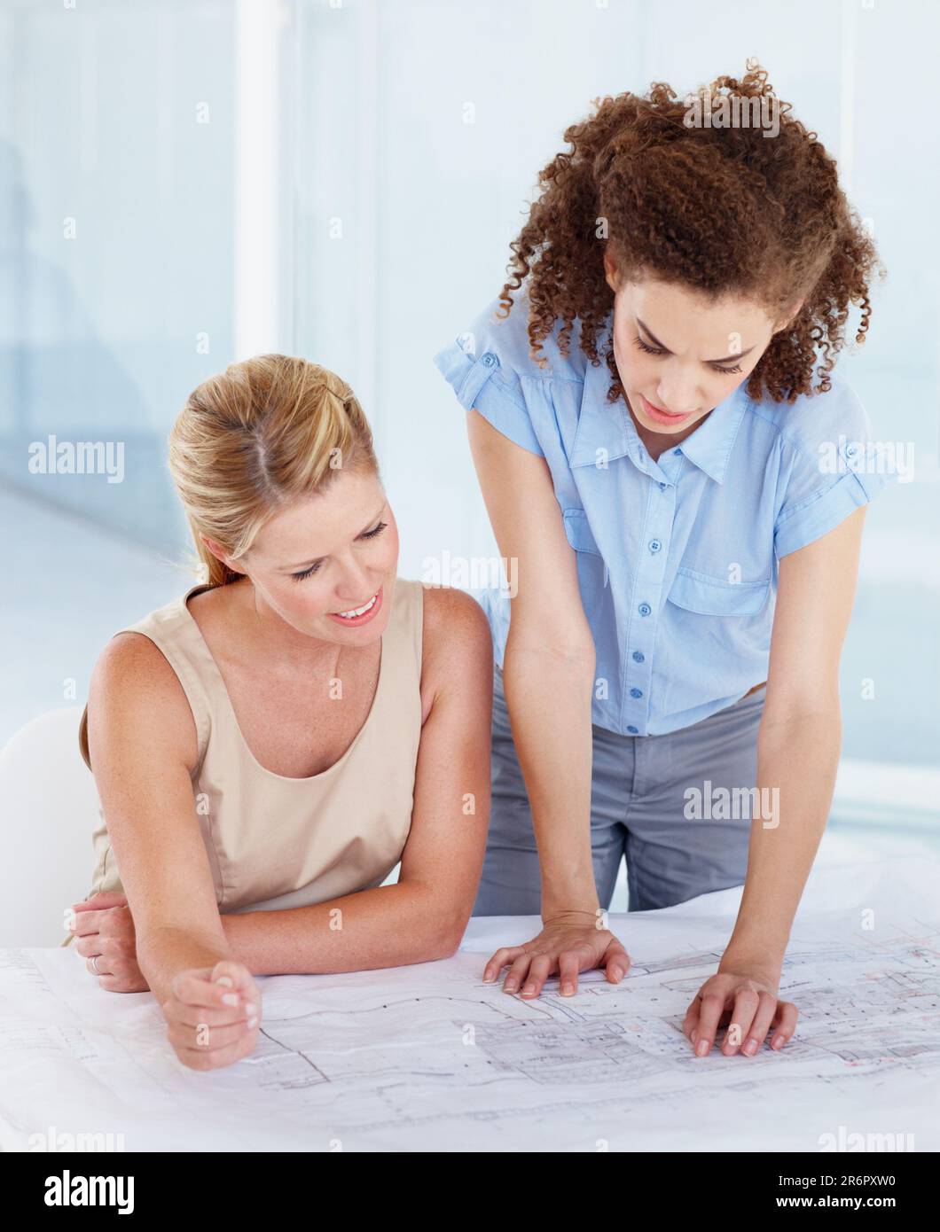 Confused business people, architect and blueprint in planning, strategy ...