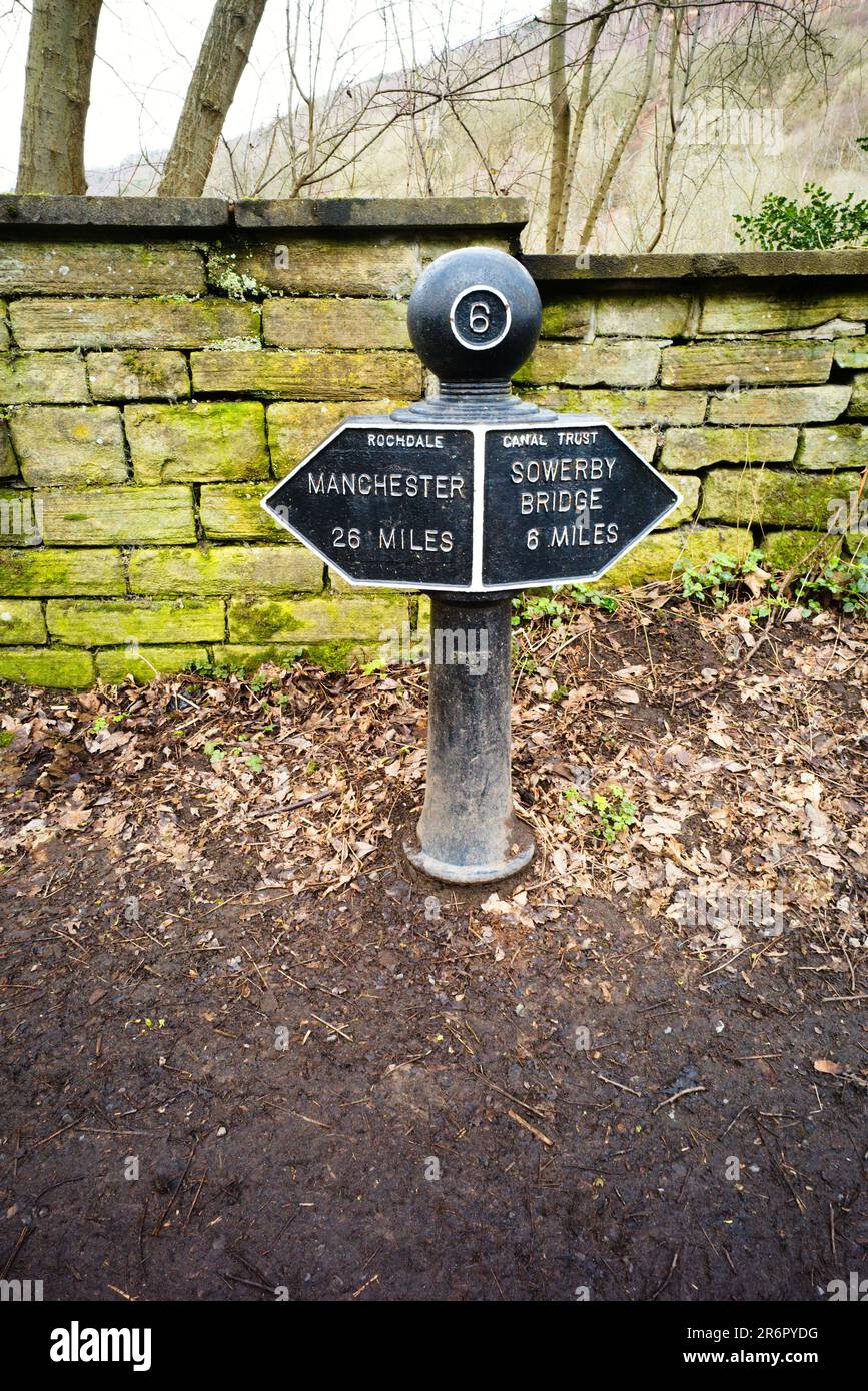 Cast iron milestone post in Hebden Bridge on the Rochdale Canal Stock ...