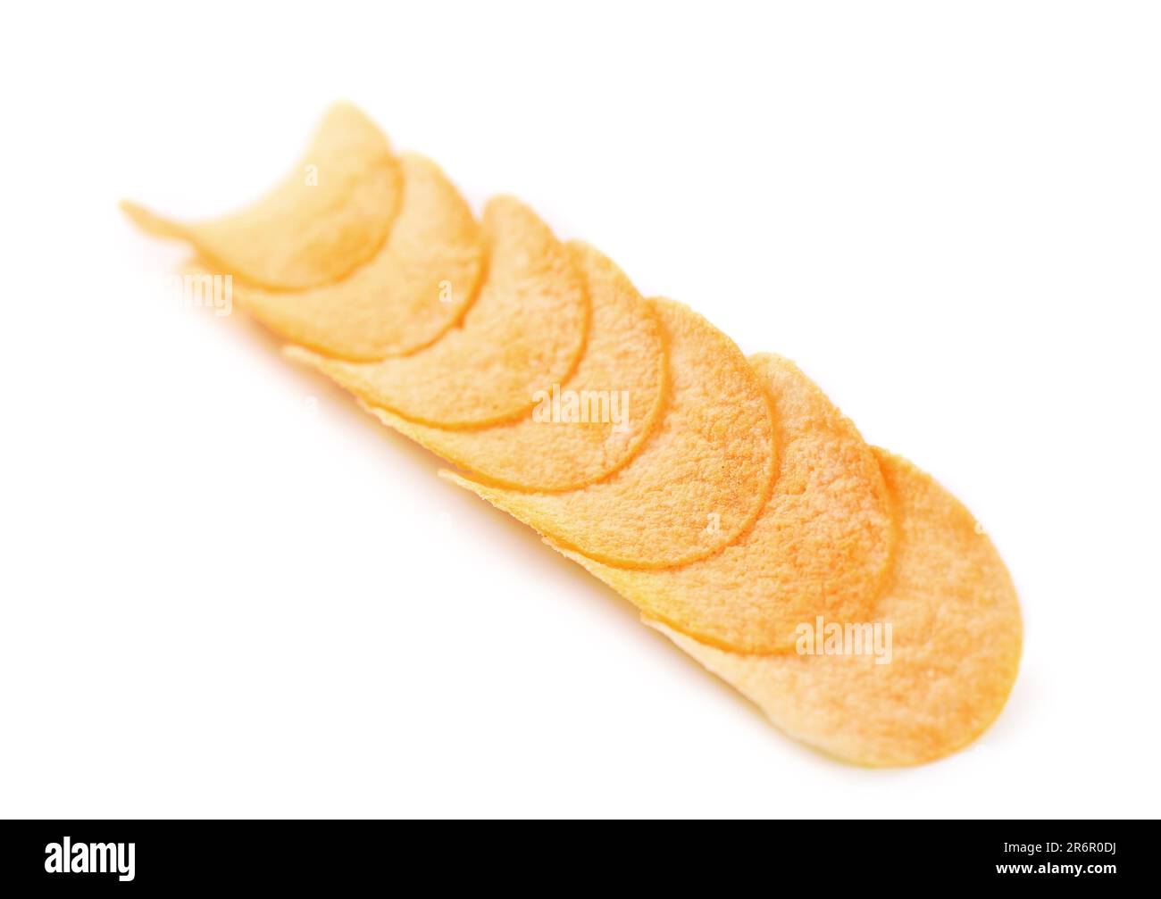 Row potato chips. Photographed on a white background Stock Photo - Alamy