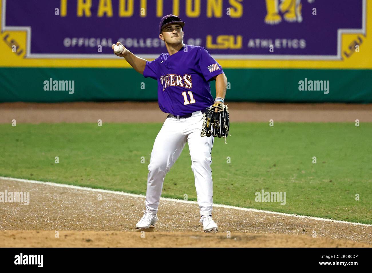 LSU outfielder Josh Pearson (11) makes a catch to force an out during ...