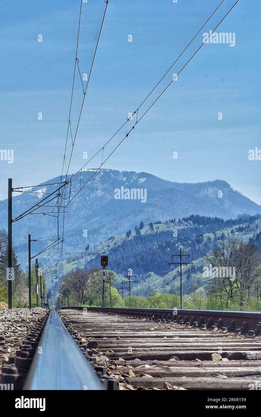 An idyllic view of the mountain, with a winding track leading up the ...