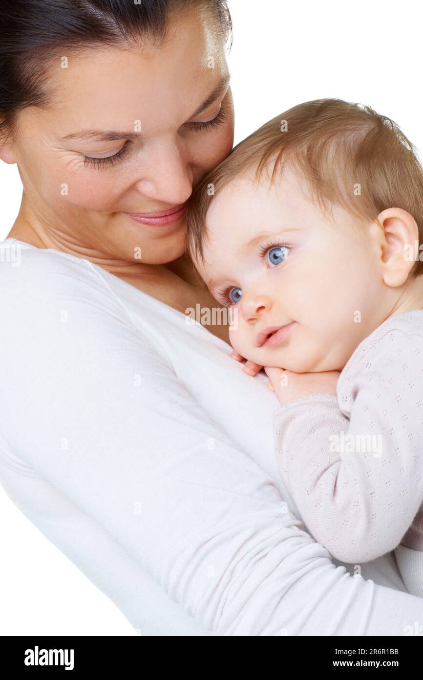 Love, smile and mother with baby in a studio hug, care and embracing ...