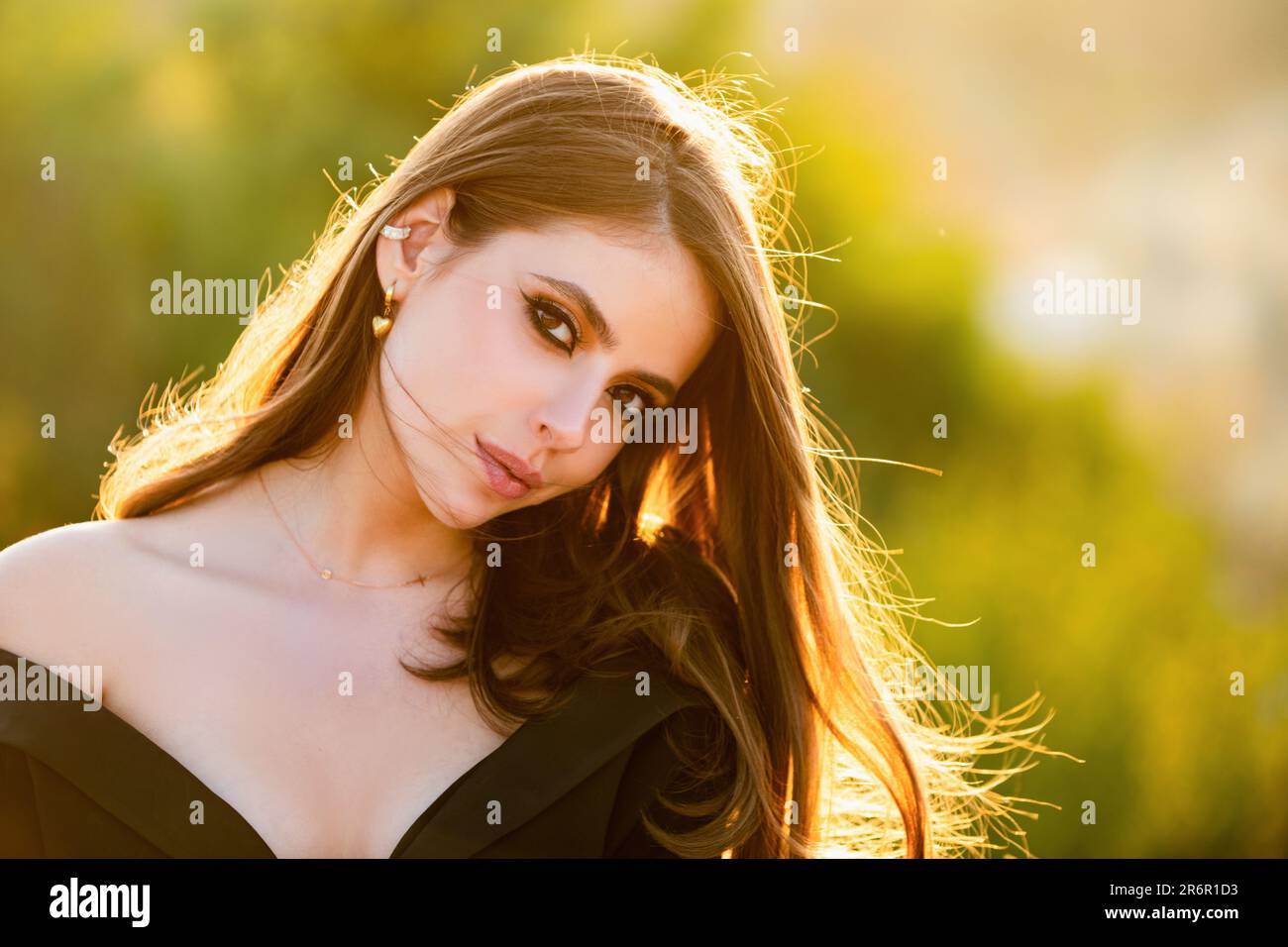 Portrait of beautiful young woman. Outdoor portrait of a cute girl ...