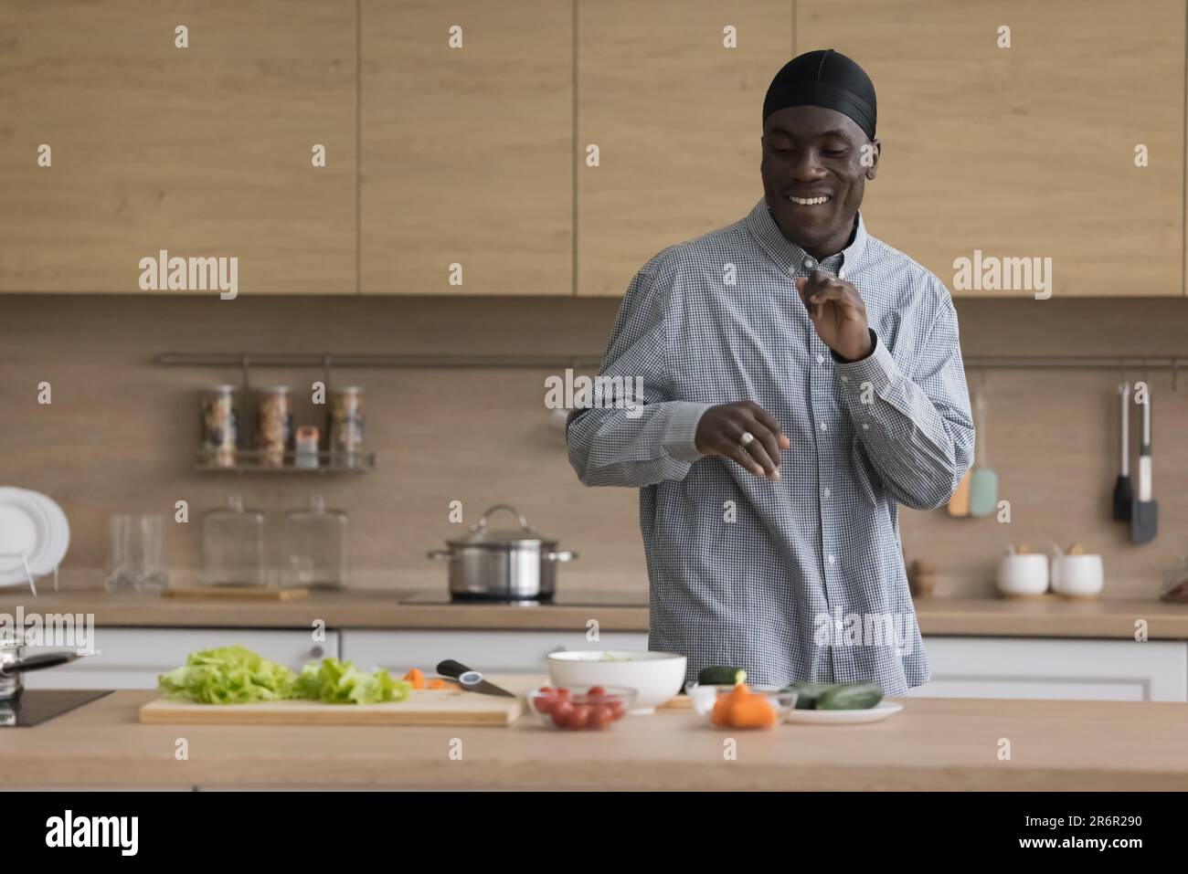 Black man male cook hi-res stock photography and images - Alamy