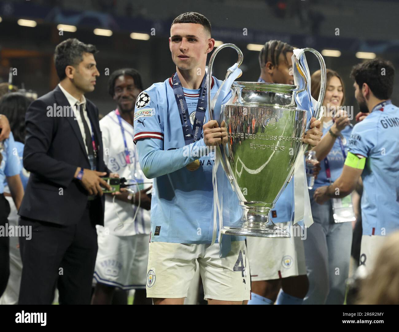 Phil Foden of Manchester City celebrates with the trophy following the ...