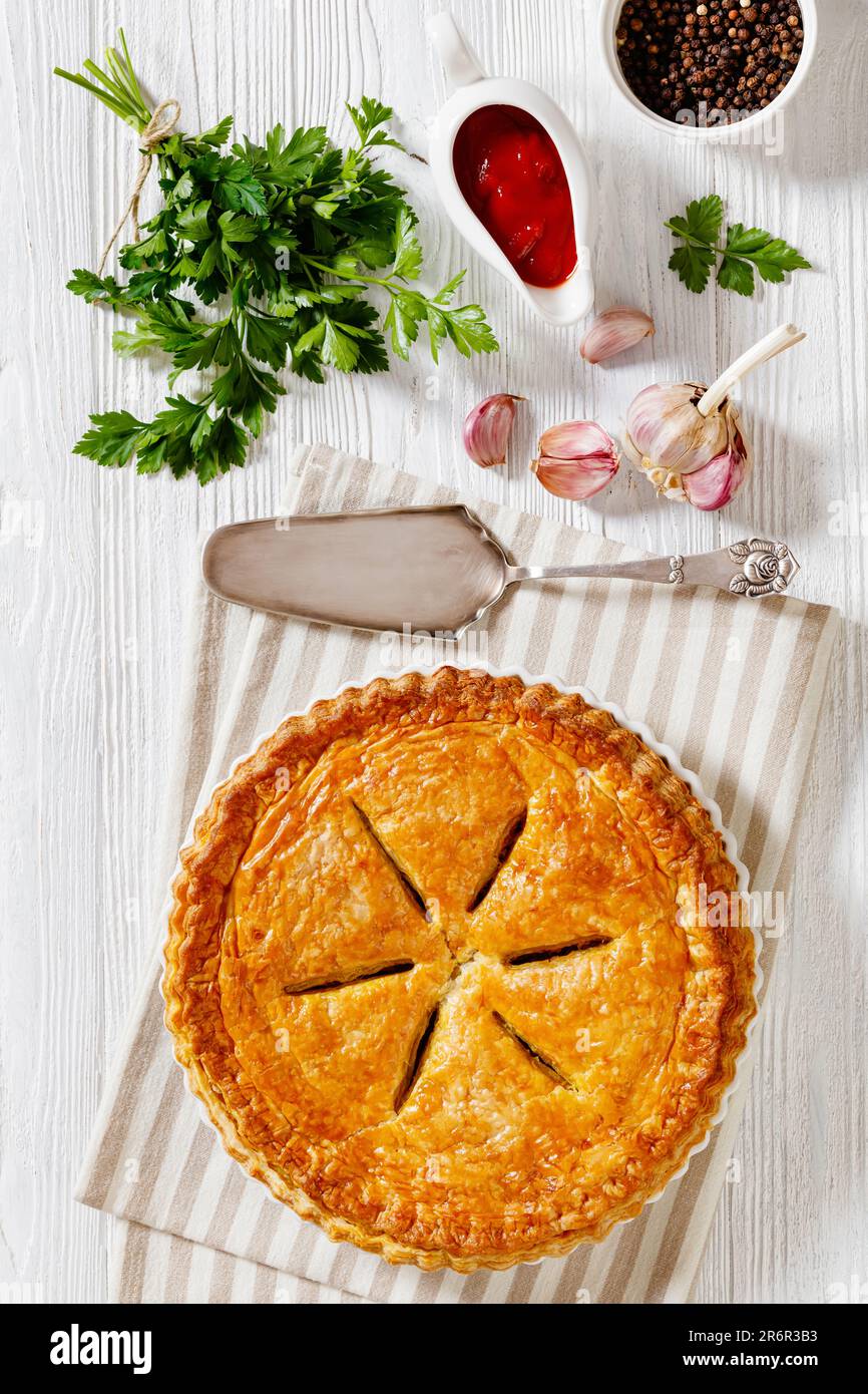 Ground Beef Meat Pie with a flaky puff pastry double crust with hearty ...