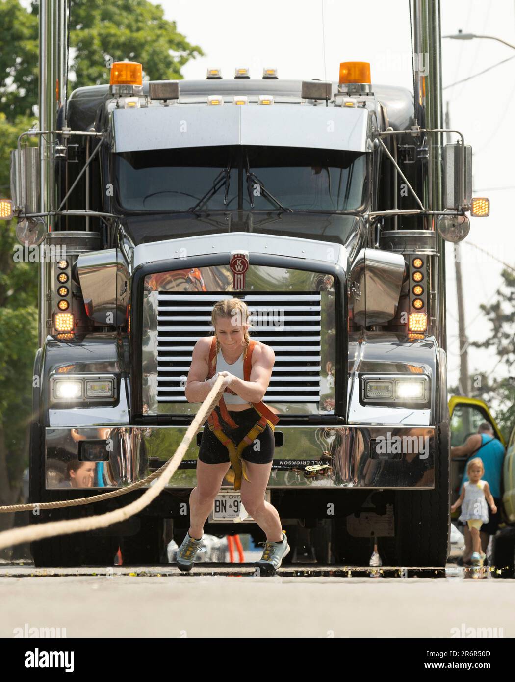 People Pulling Trucks