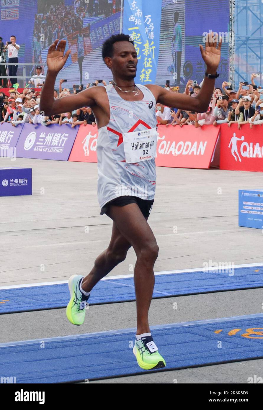 Lanzhou. 11th June, 2023. Hailemaryam Kiros of Ethiopia dashes past the ...