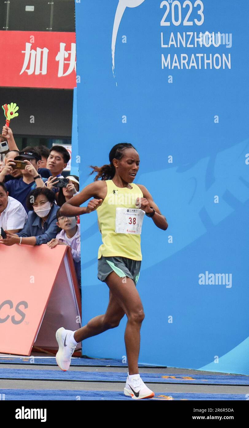 Lanzhou. 11th June, 2023. Tadelech Bekele of Ethiopia dashes past the ...