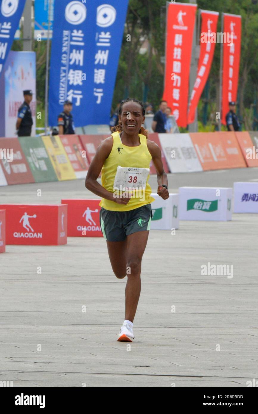 Lanzhou. 11th June, 2023. Tadelech Bekele of Ethiopia dashes to the ...